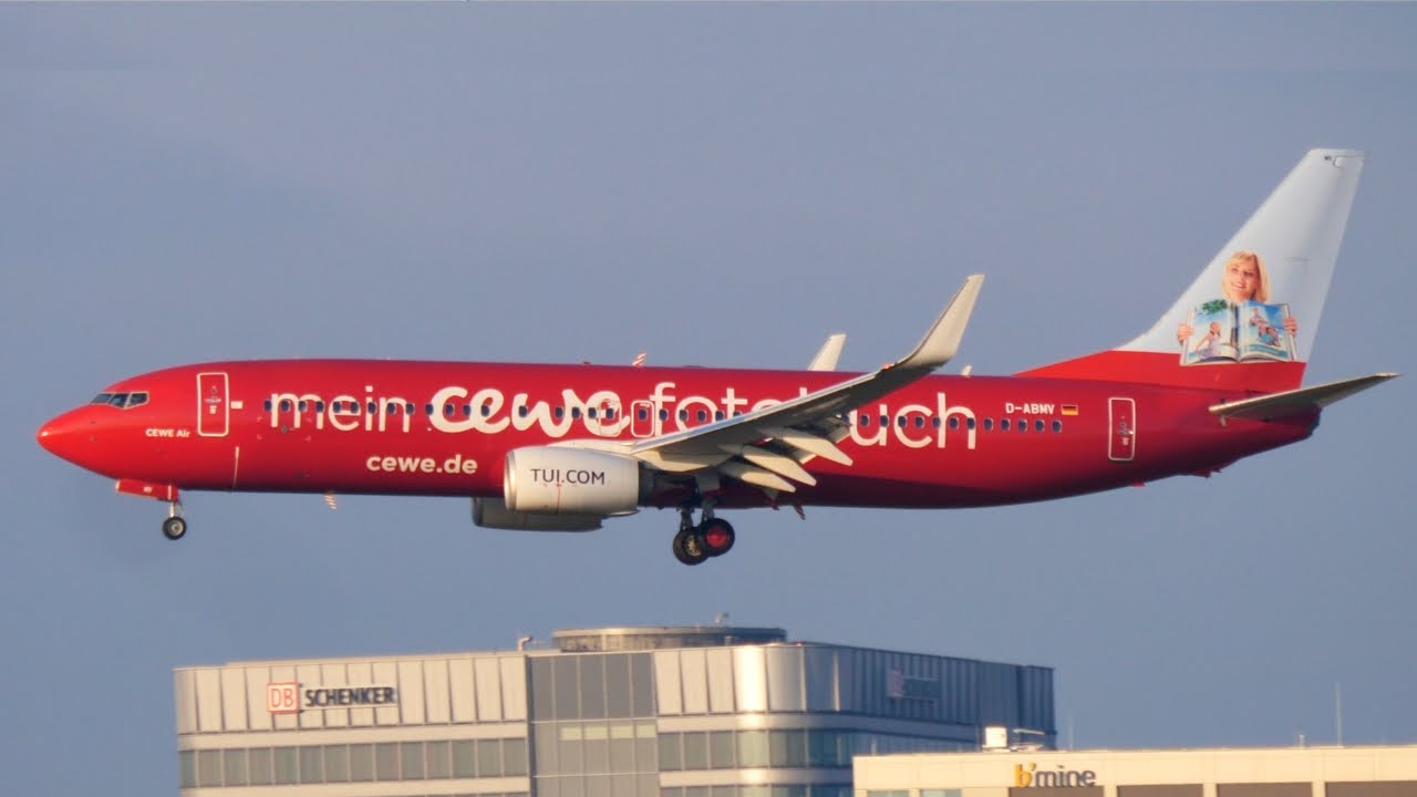 Red Boeing 737 landing at Frankfurt from Lanzarote - City Traveller Europe